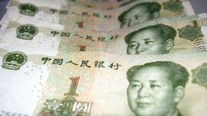 Moeda chinesa atinge a menor mínima ante o dólar em 11 anos e meio ...